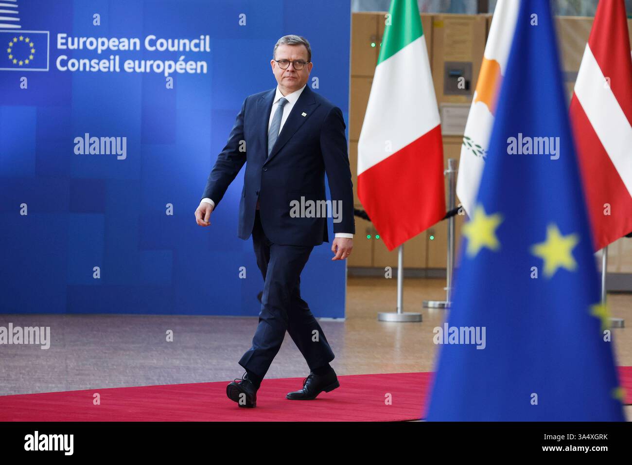 Finland's Prime Minister Petteri Orpo arrives for an EU summit at the European Council building ...