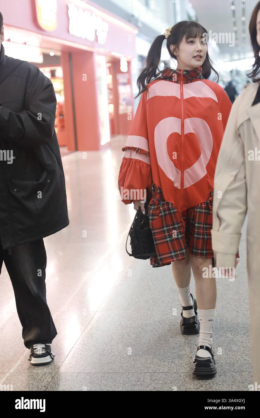 Chinese idol singer and actress Li Yitong appears at the airport in ...