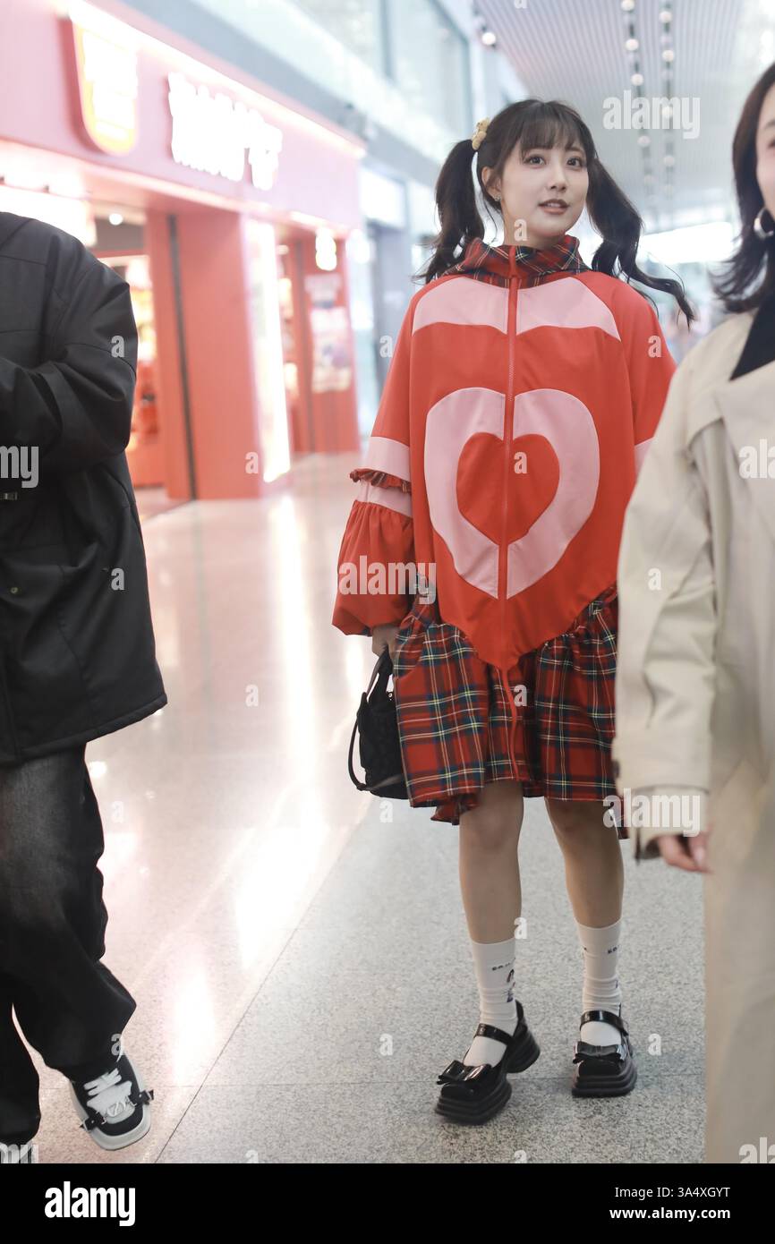 Chinese idol singer and actress Li Yitong appears at the airport in ...