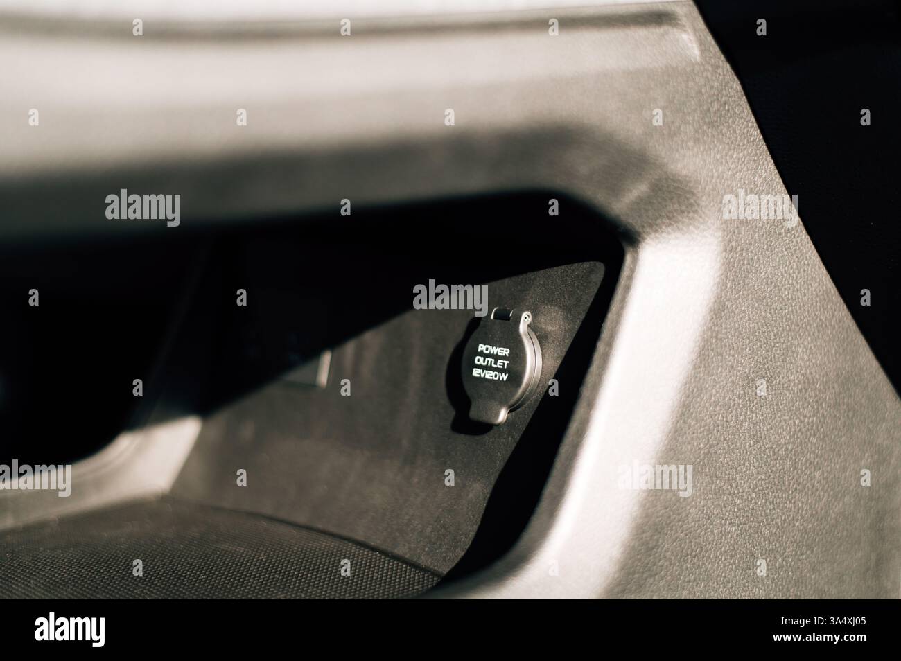 Phone charging socket in the car Stock Photo - Alamy