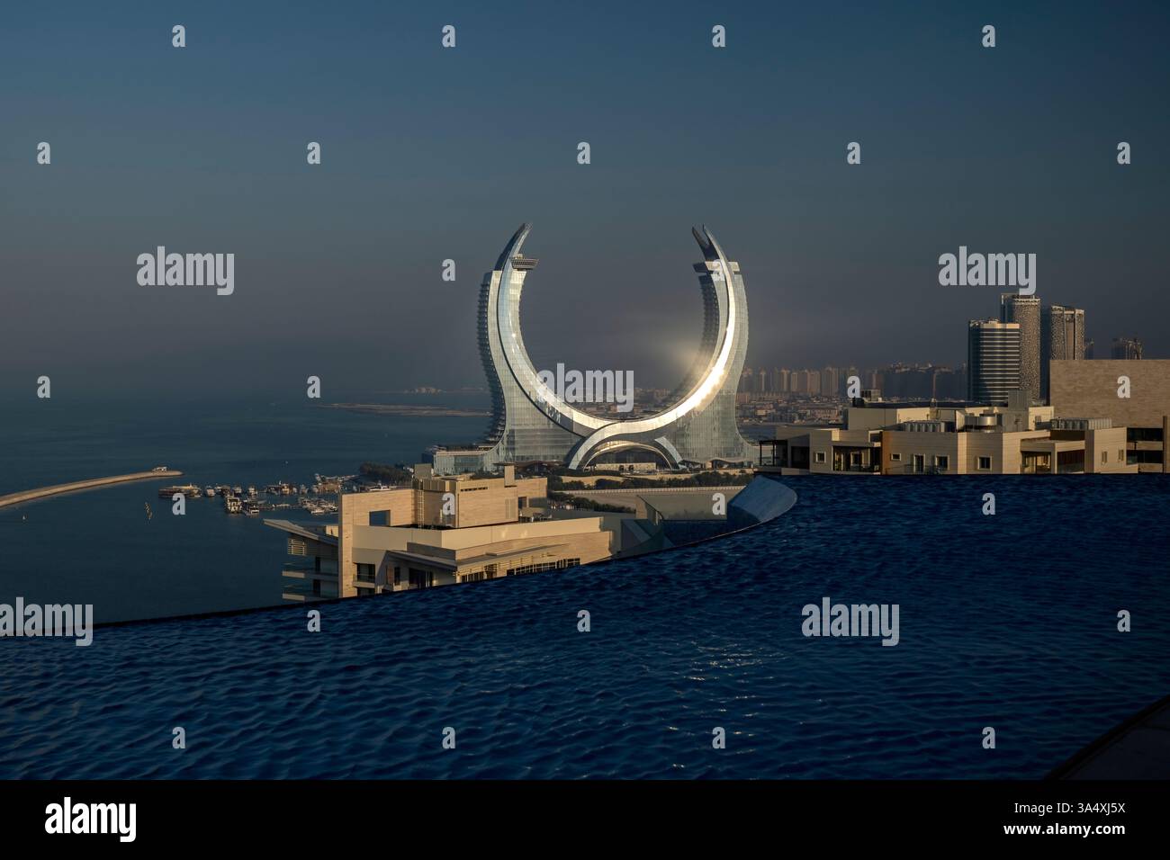Katara hotel view from Lusail Marina Park. Crescent Tower Fairmont Doha ...