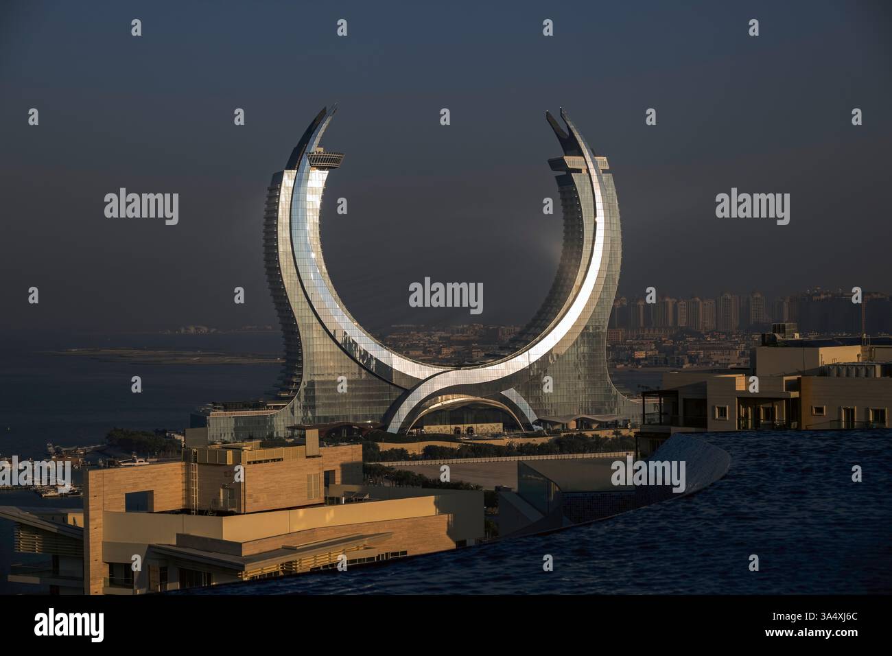 Katara hotel view from Lusail Marina Park. Crescent Tower Fairmont Doha ...