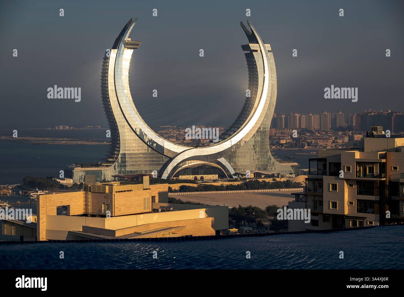 Katara hotel view from Lusail Marina Park. Crescent Tower Fairmont Doha ...