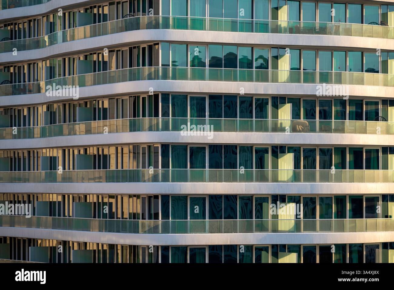 A close-up look at a modern high-rise building in Lusail, showcasing ...