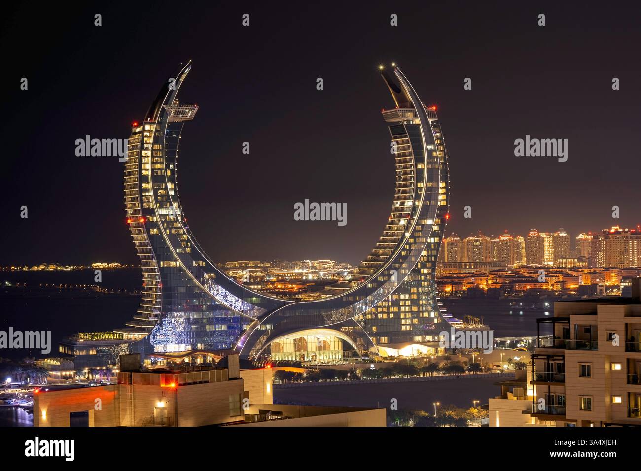 Katara hotel view from Lusail Marina Park. Crescent Tower Fairmont Doha ...