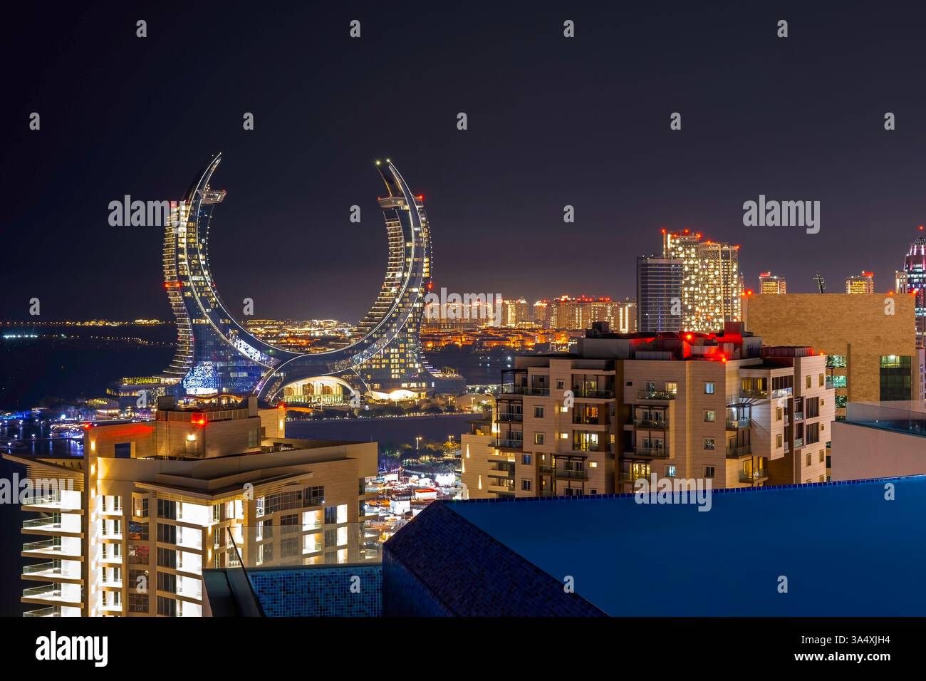 Katara hotel view from Lusail Marina Park. Crescent Tower Fairmont Doha ...