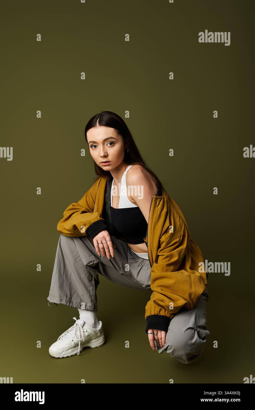 Young woman in trendy clothes poses confidently, capturing everyones ...