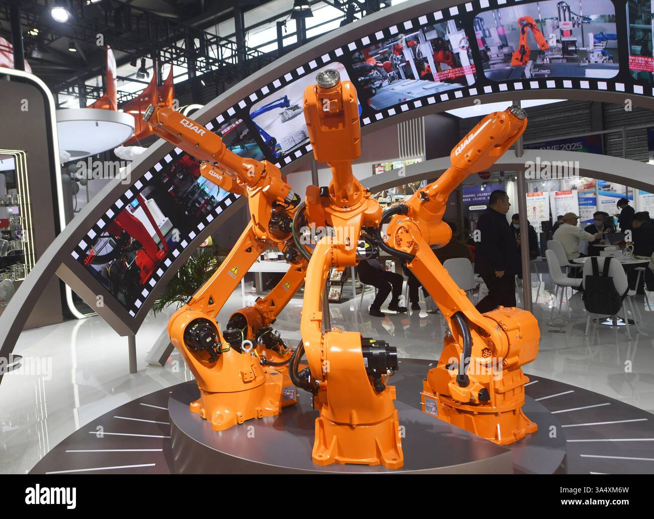 A smart robotic arm for home appliance manufacturing on display at ...