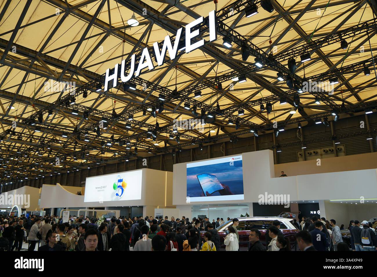 SHANGHAI, CHINA - MARCH 20, 2025 - Visitors visit the HUAWEI booth at ...