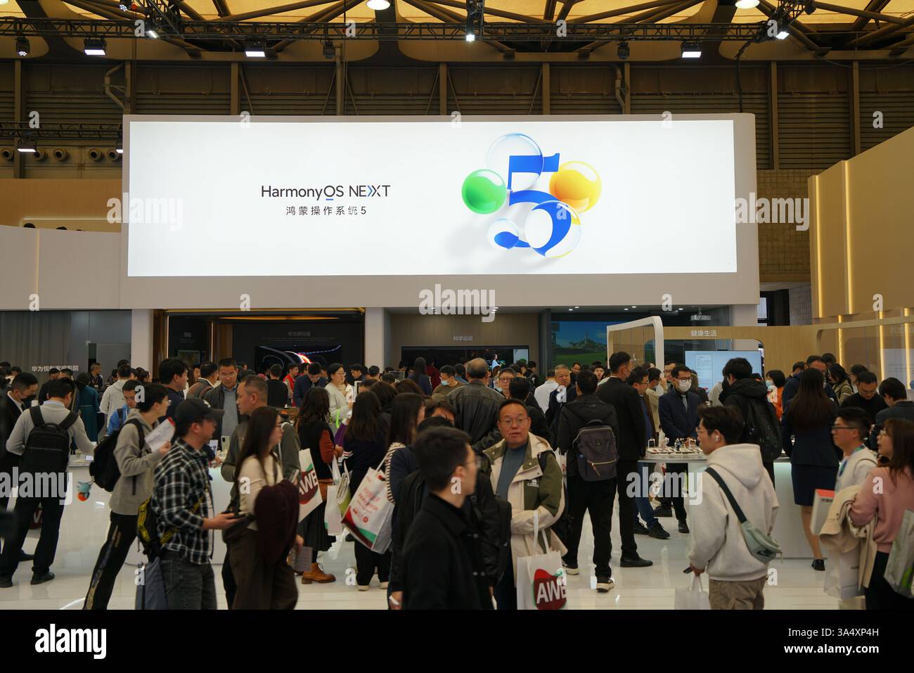 SHANGHAI, CHINA - MARCH 20, 2025 - Visitors visit the HUAWEI booth at ...
