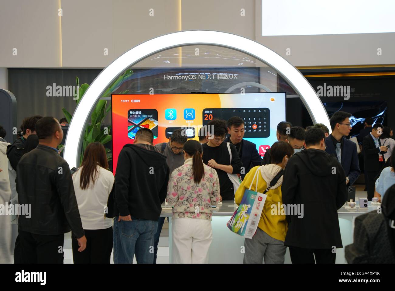 SHANGHAI, CHINA - MARCH 20, 2025 - Visitors visit the HUAWEI booth at ...