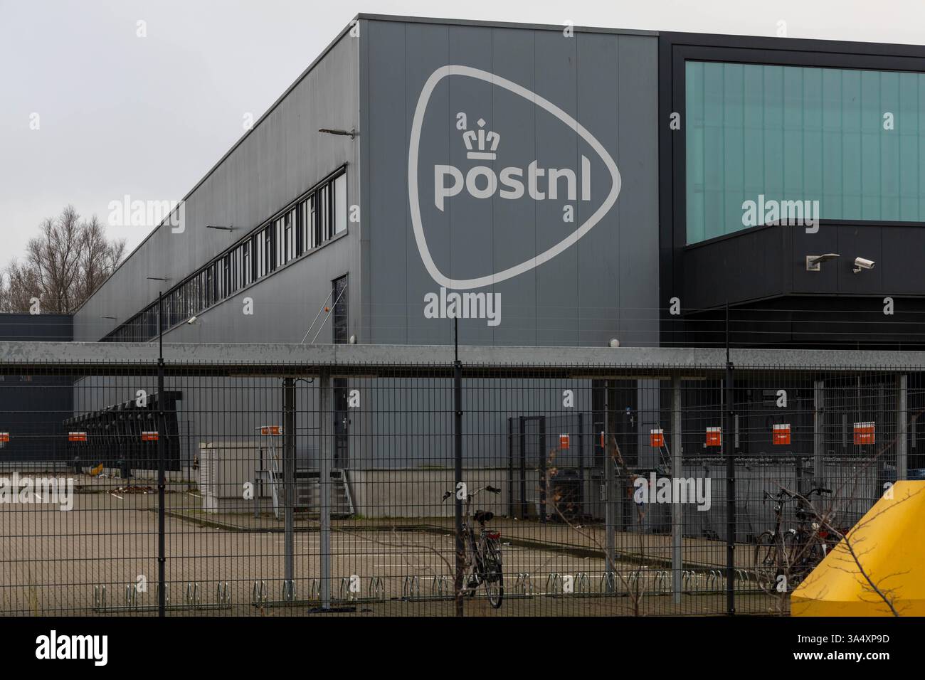 Postnl logo sign on sorting center. The national and biggest postal ...
