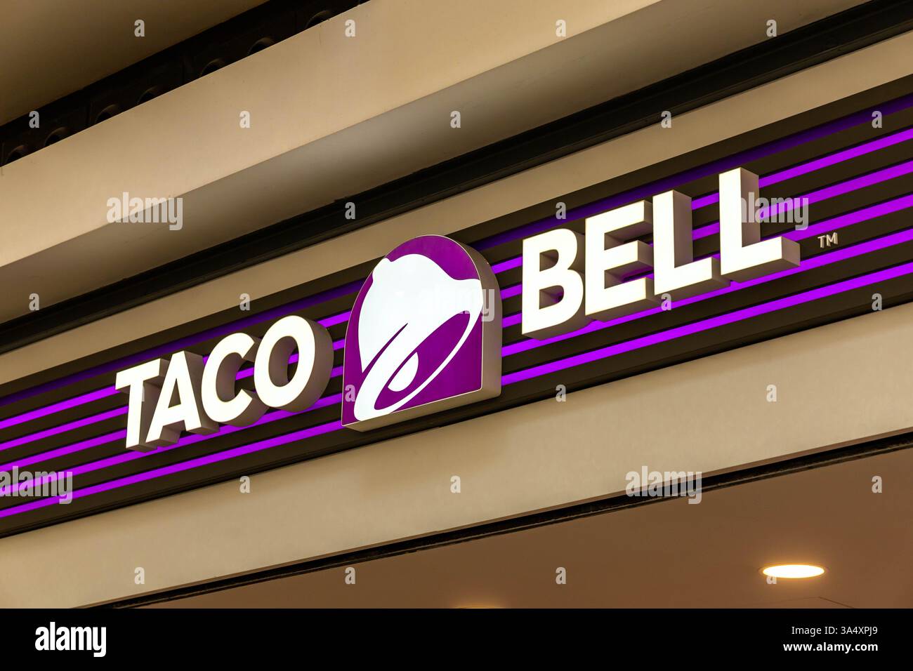 Taco Bell logo sign at the restaurant. Taco Bell is an American fast ...