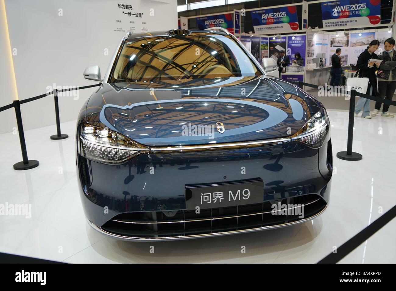 SHANGHAI, CHINA - MARCH 20, 2025 - Visitors view AITO's new M9 model on display at the HUAWEI ...