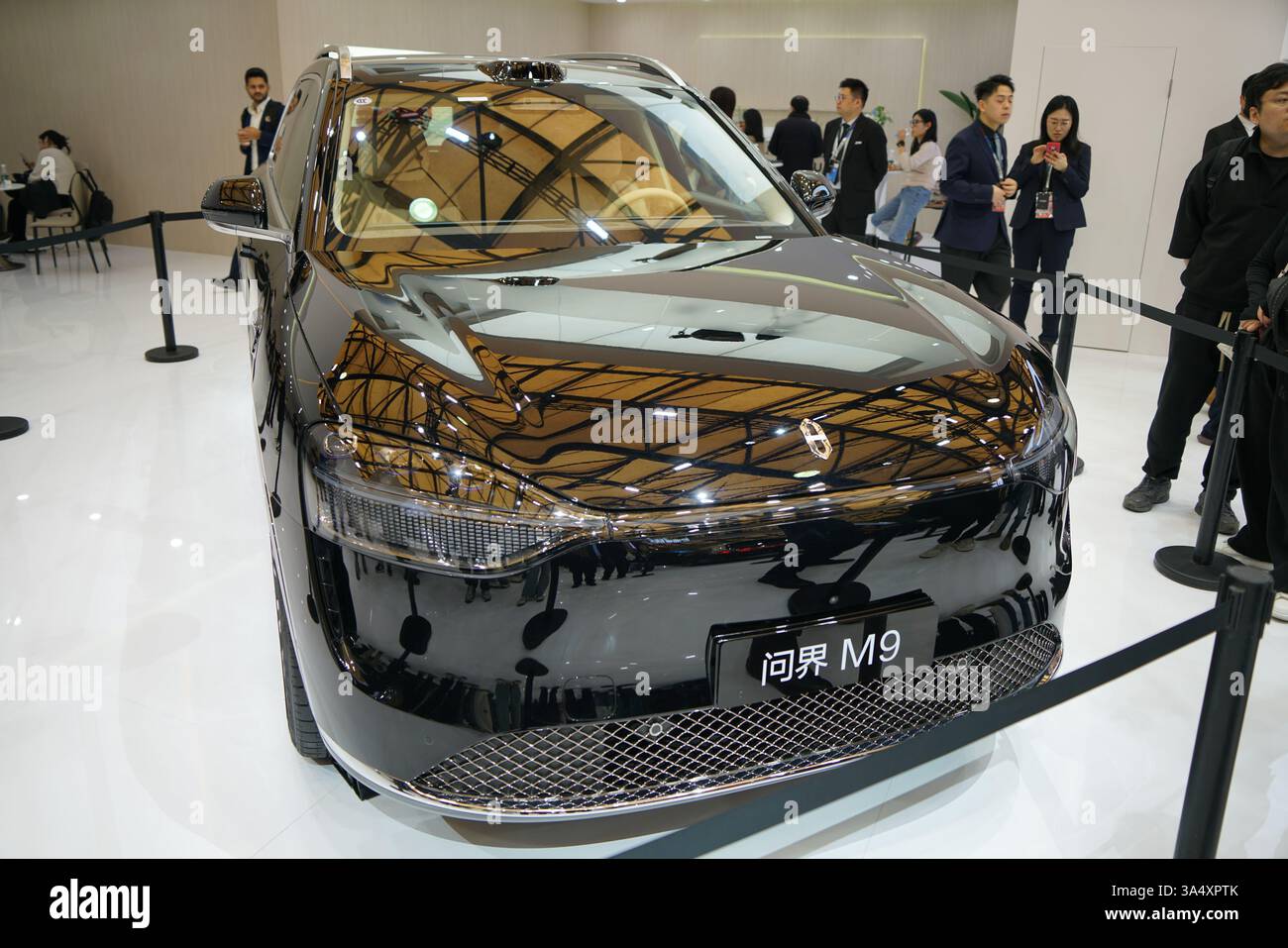 SHANGHAI, CHINA - MARCH 20, 2025 - Visitors view AITO's new M9 model on display at the HUAWEI ...