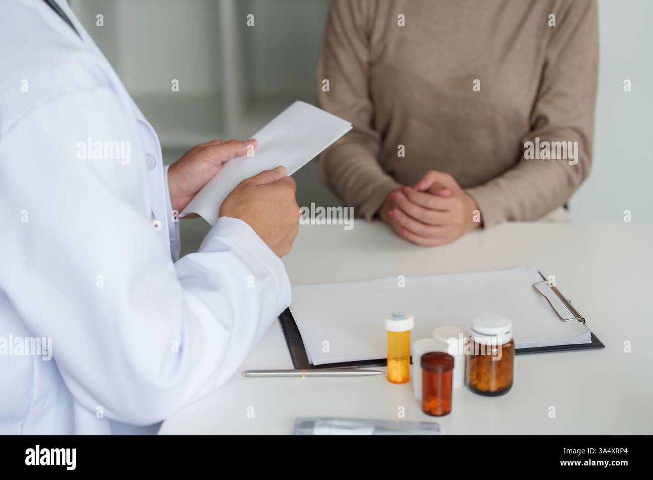 Patient Education and Medication Discussion. A doctor sharing important ...