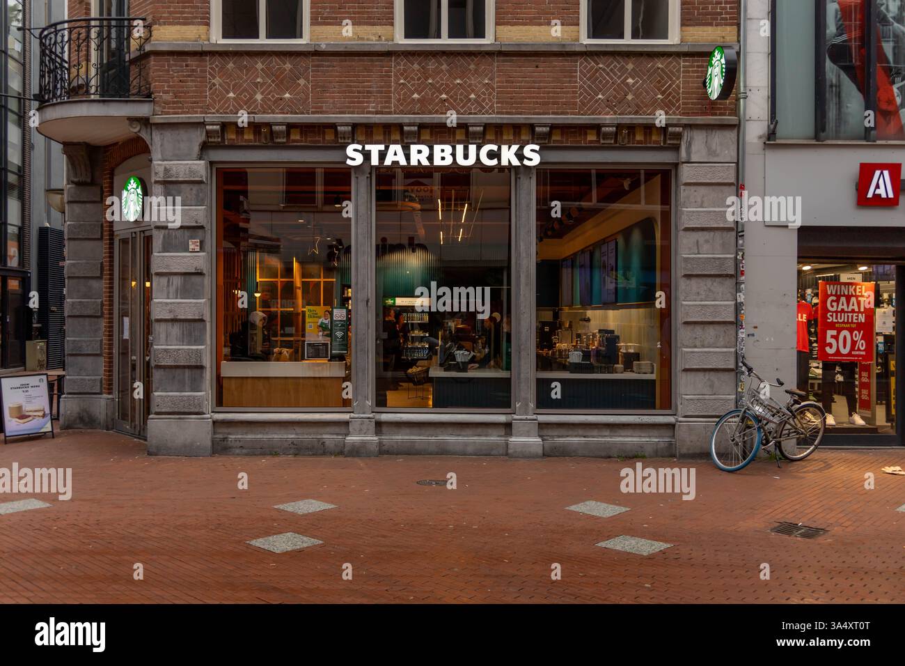 Starbucks logo sign. Starbucks advertising logo sign on a coffee shop ...