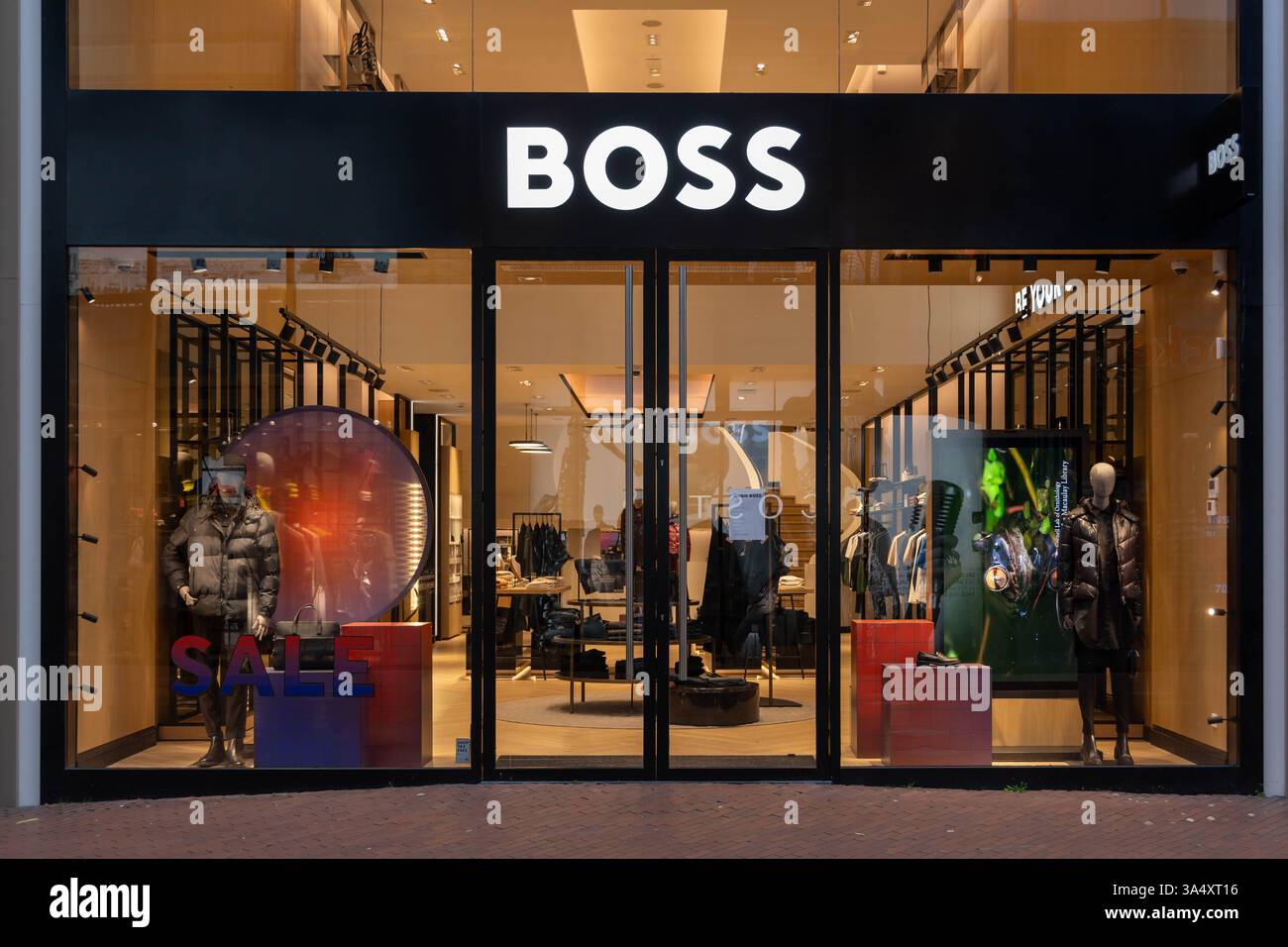 Boss store window and logo sign. Hugo Boss as one brand name. Years ago ...