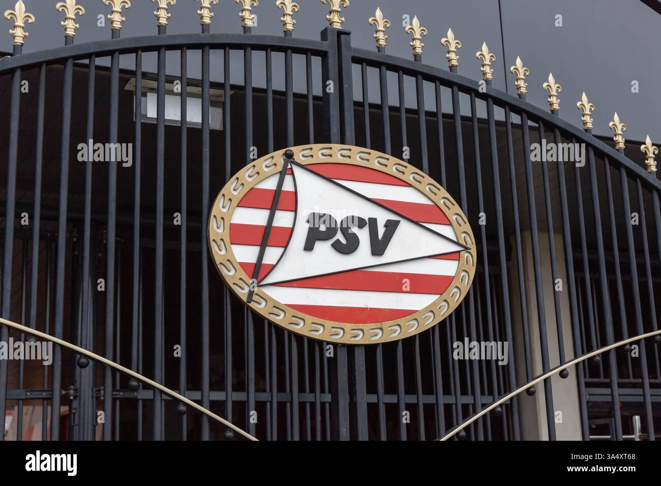 PSV logo at the metal gate fence of the Philips stadium. In Eindhoven ...