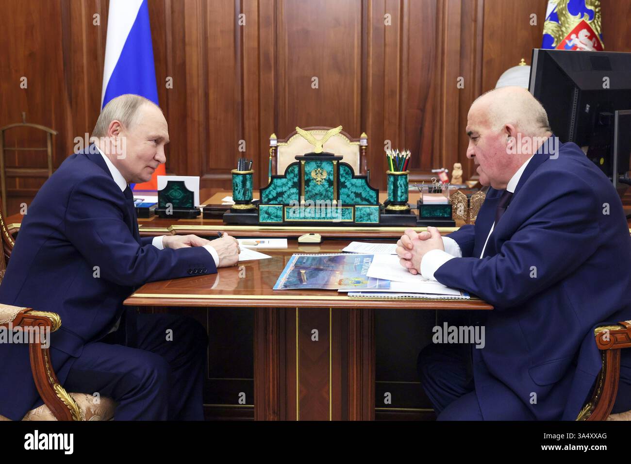 Russian President Vladimir Putin, left, speaks with the governor of Kostroma region Sergei ...