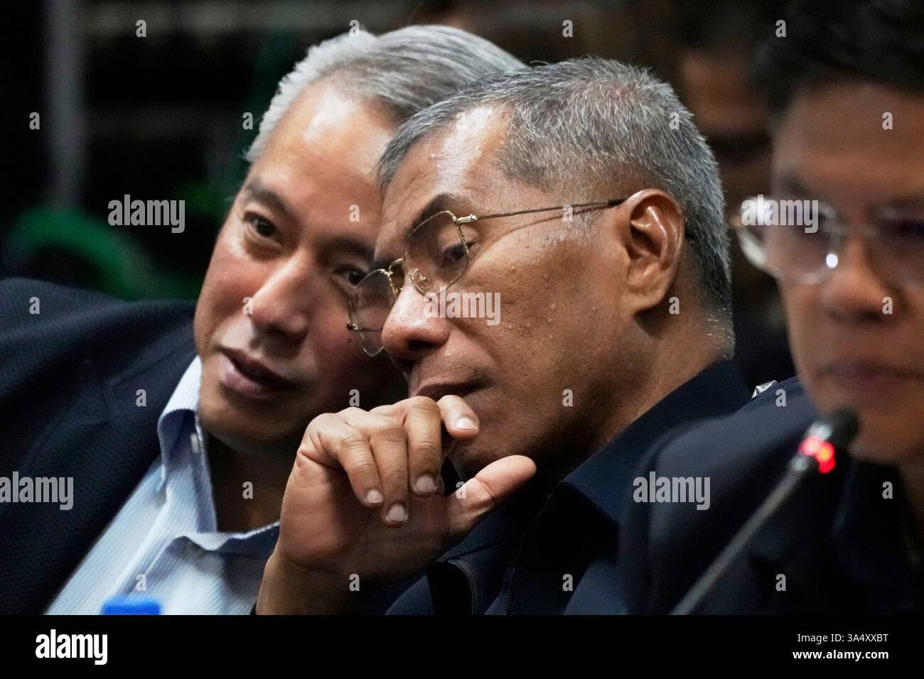 Police Brigadier General Nicolas Torre, center, speaks with Department ...