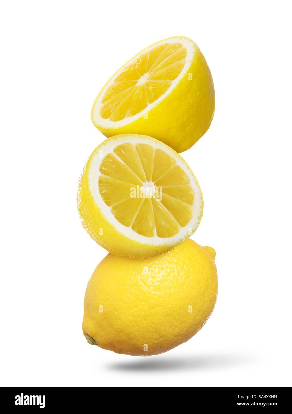Cut and whole fresh lemons falling on white background Stock Photo - Alamy