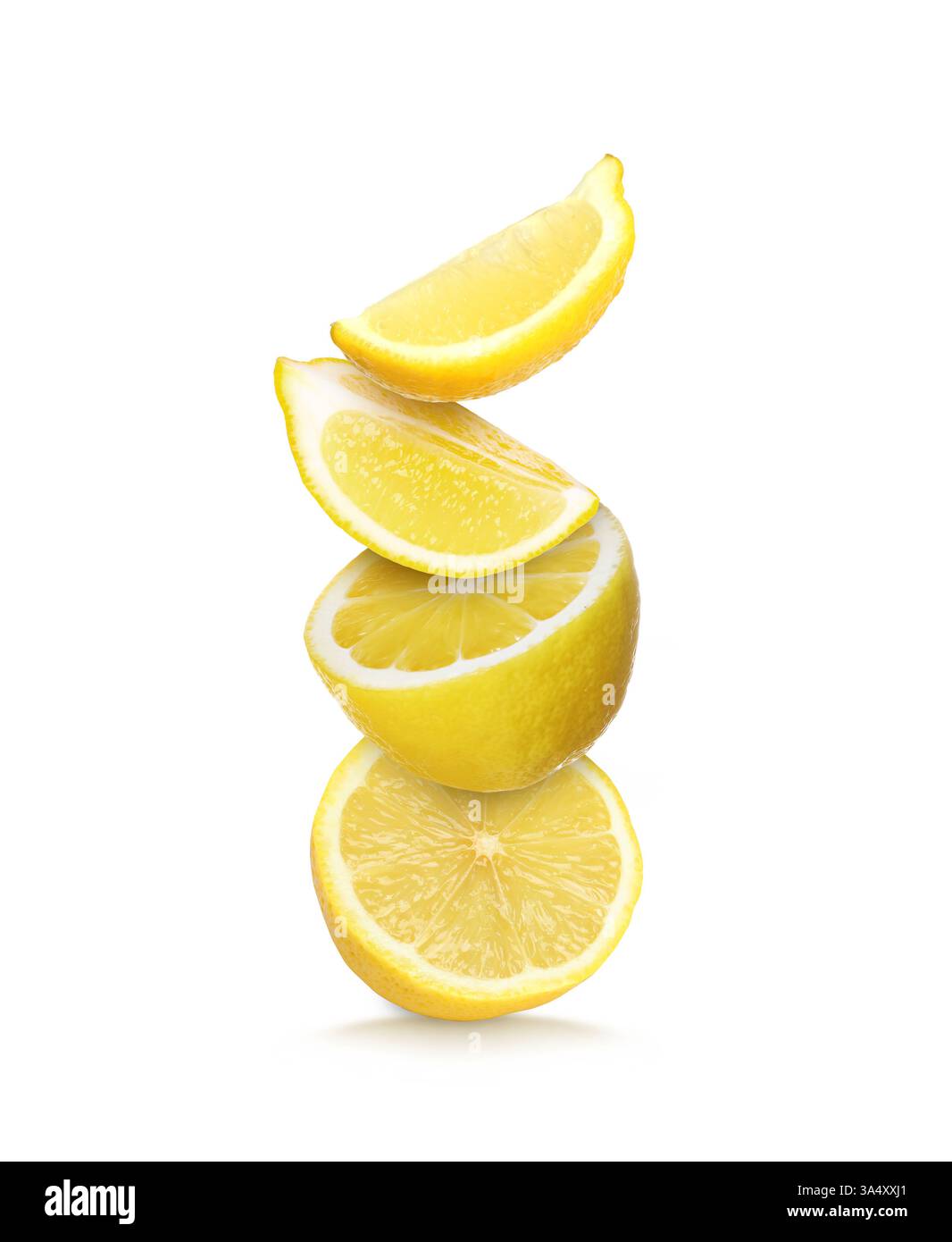 Cut fresh lemons falling on white background Stock Photo - Alamy
