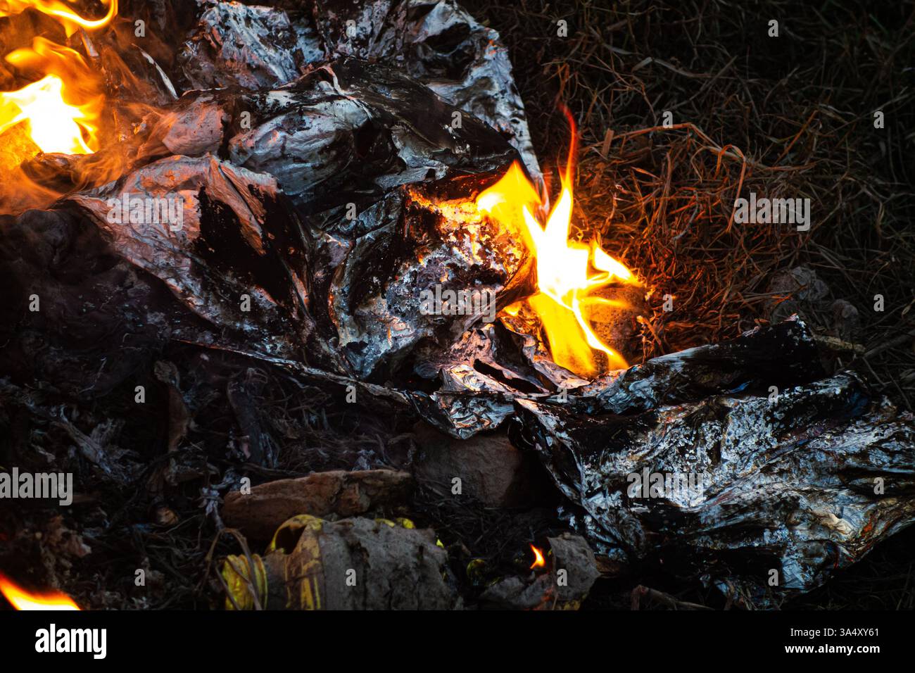 Garbage burning in the fire old night vintage scene. Burning fire ...