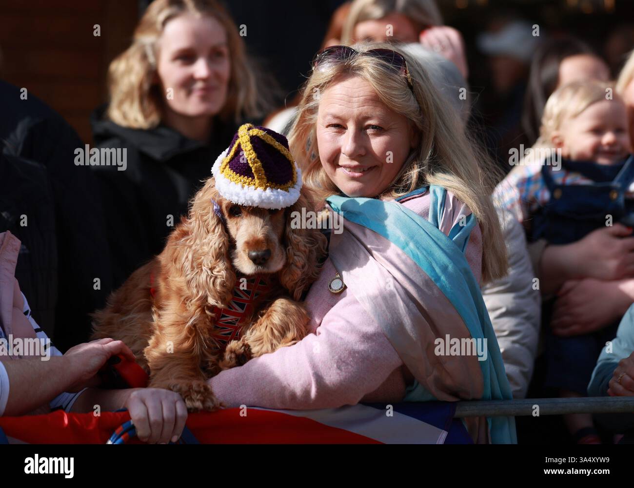 Nadine Conner holding her English Cocker Spaniel Lily as waits for the ...