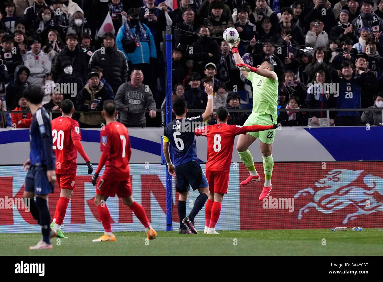 Bahrain's goalkeeper Ebrahim Lutfallah makes a save during the World ...
