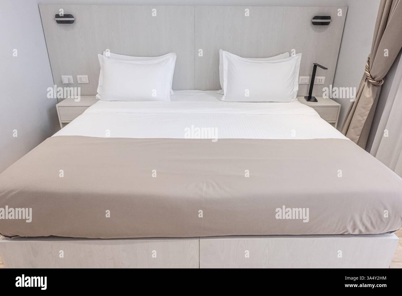 Bedroom With Large Bed. Cozy bedroom interior. Modern apartment ...