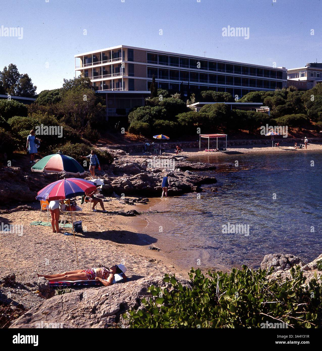 The W H Woodroffe Collection; Location; Greece; Lagonissi; A secluded beach cove with a nearby ...