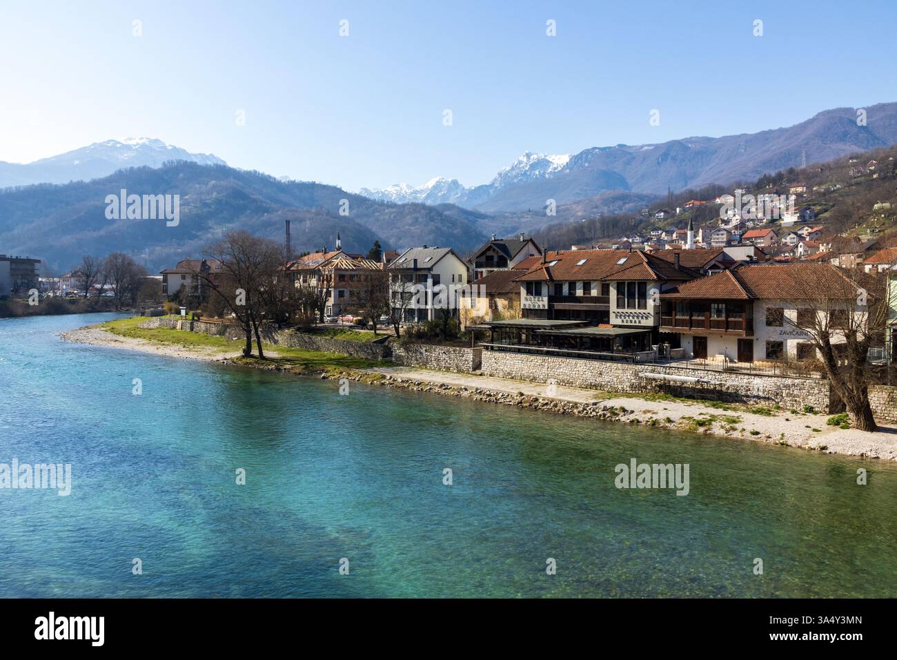 Buildings on the bank of the Neretva River in the historic town of ...