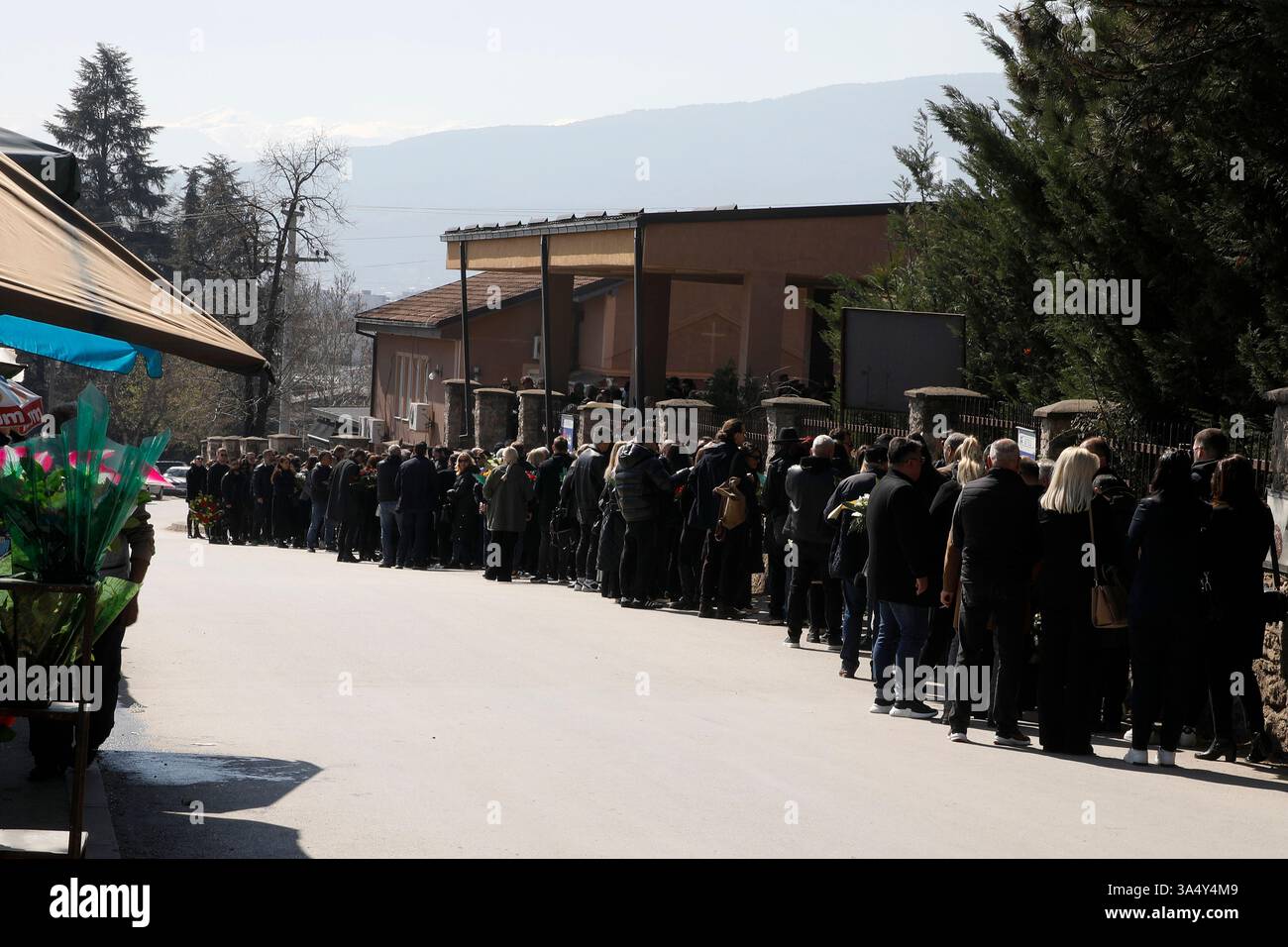 Relatives and friends gather at a chapel for the funeral of Andrej ...