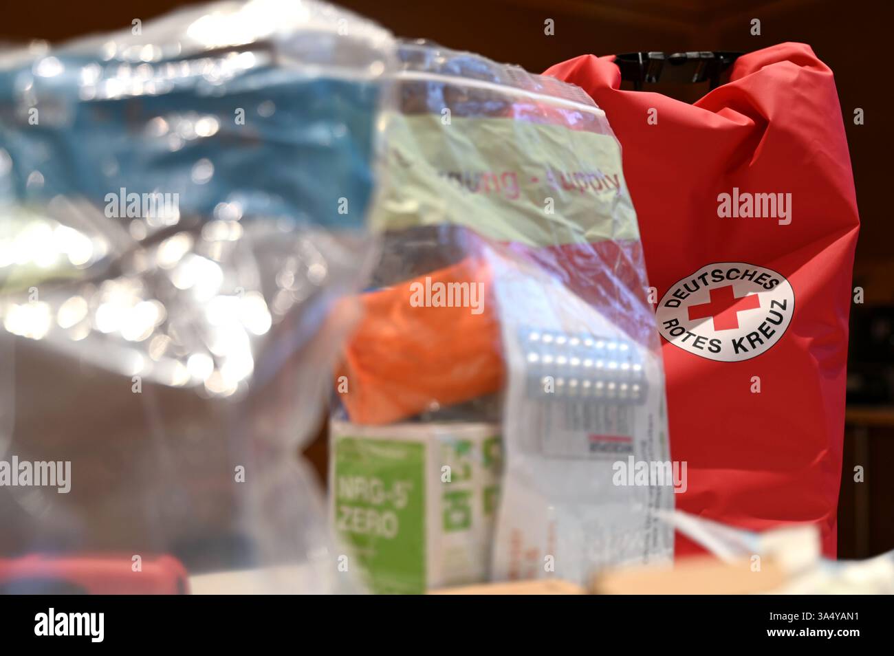 19 March 2025, Berlin: A DRK 48h emergency preparedness package is on a table at a German Red ...