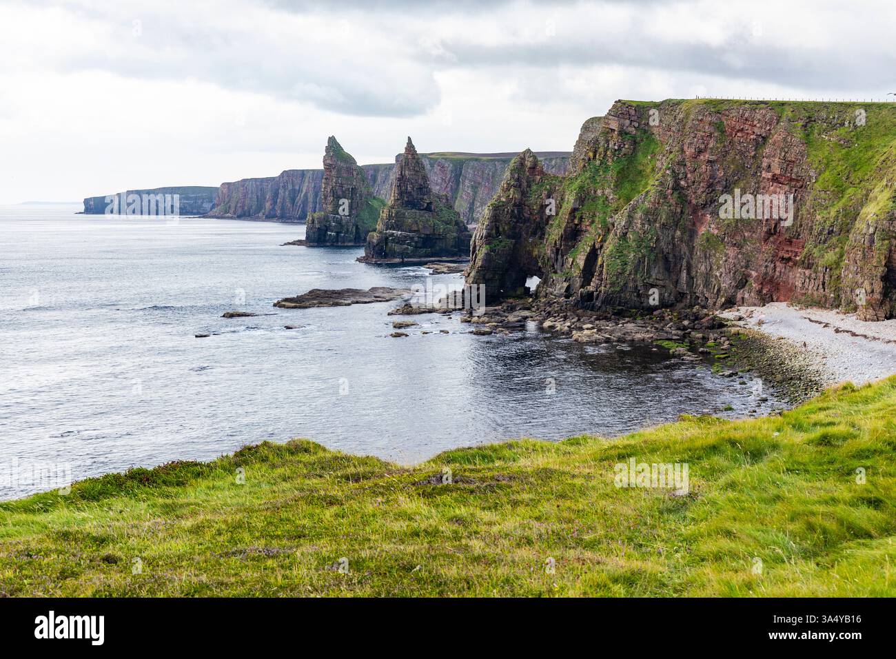 Duncansby Stacks, a breathtaking coastal wonder in Scotland, rise from the North Sea. Standing ...