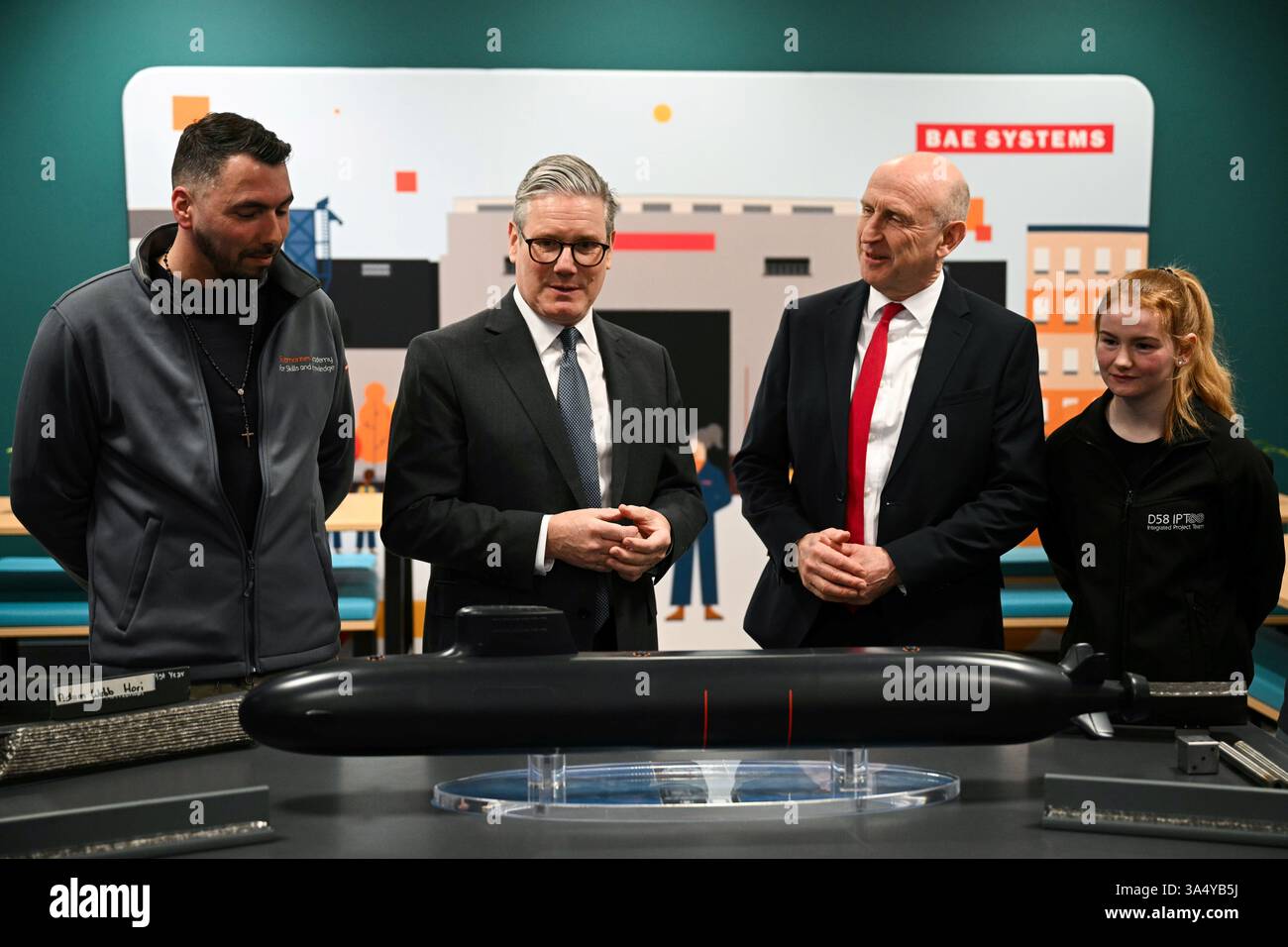 Prime Minister Sir Keir Starmer (centre left) and Defence Secretary ...