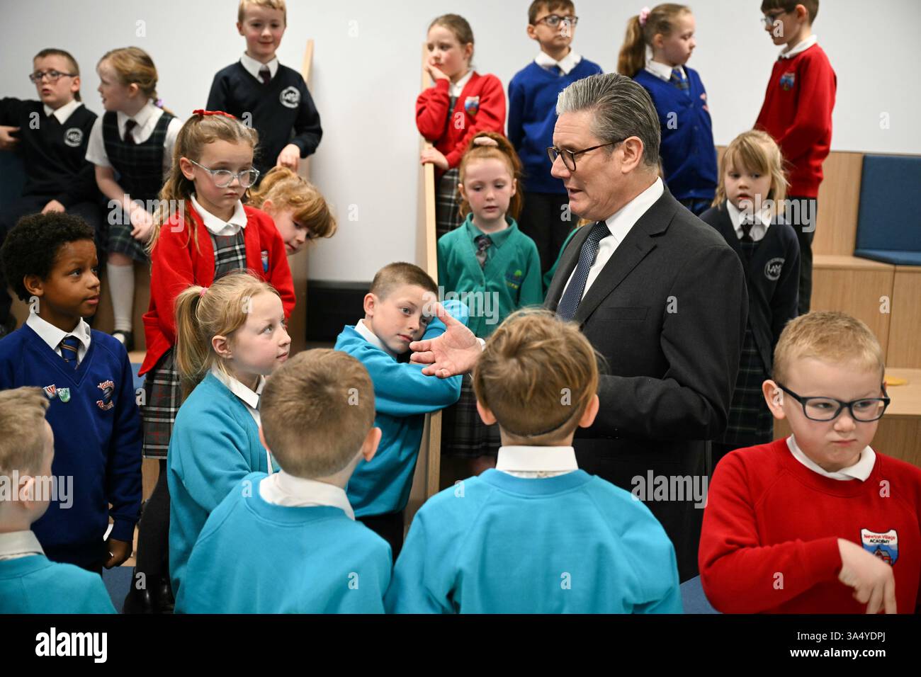 Prime Minister Sir Keir Starmer speaks to school children taking part ...
