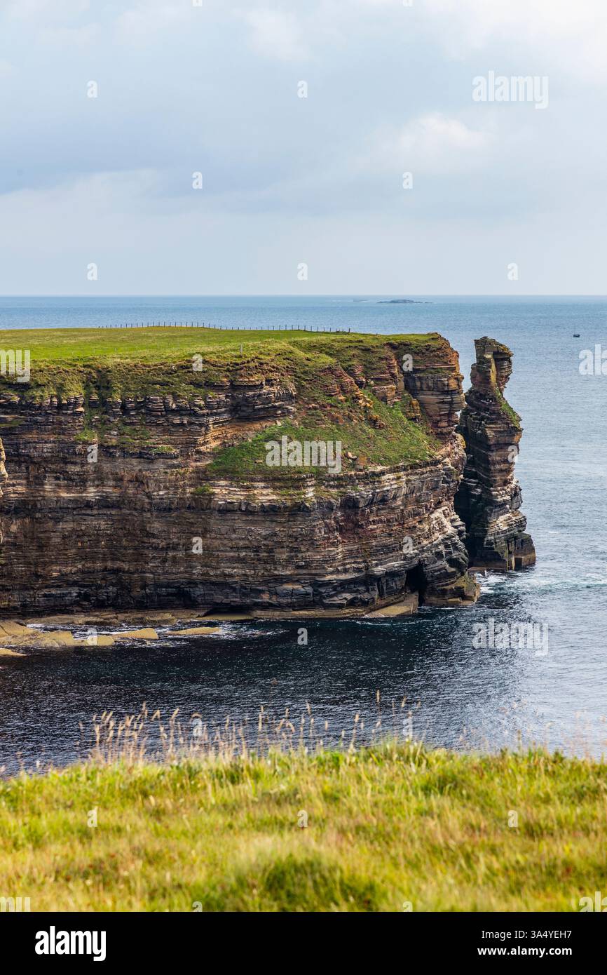 Duncansby Stacks, a breathtaking coastal wonder in Scotland, rise from the North Sea. Standing ...