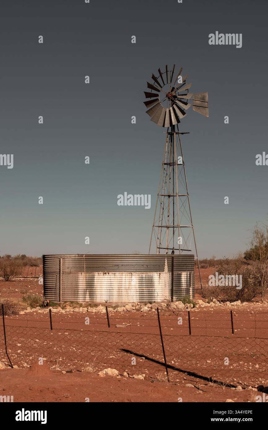 wind turbine water pump in desert of Namibia Stock Photo - Alamy