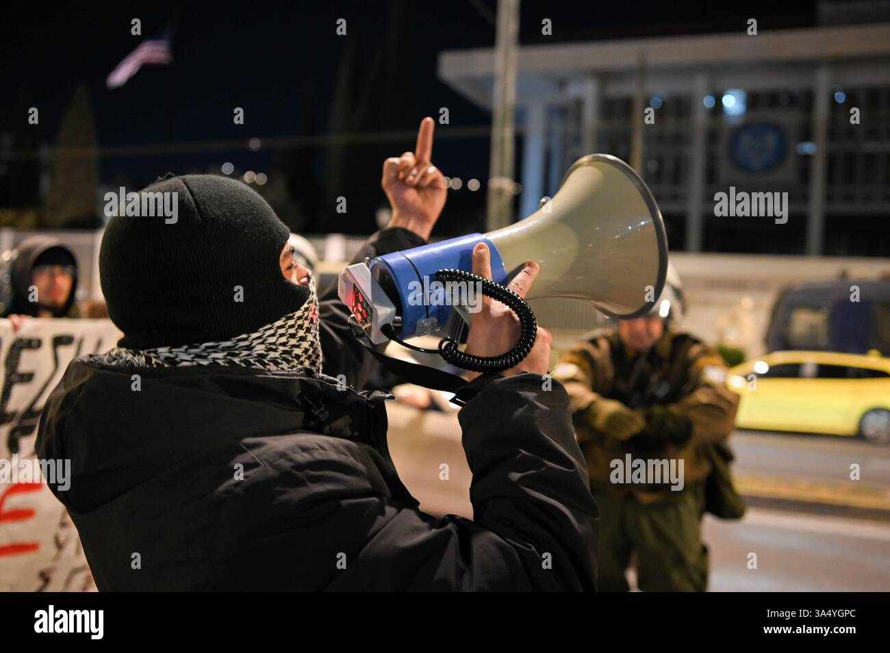 Athens, Greece, 19 March 2025. Pro Palestine protester wearing ...