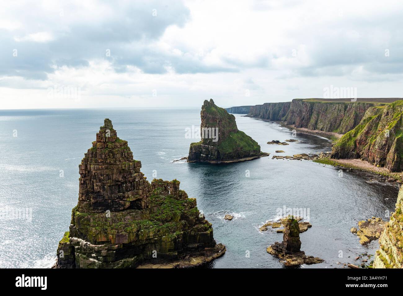 Duncansby Stacks, a breathtaking coastal wonder in Scotland, rise from the North Sea. Standing ...