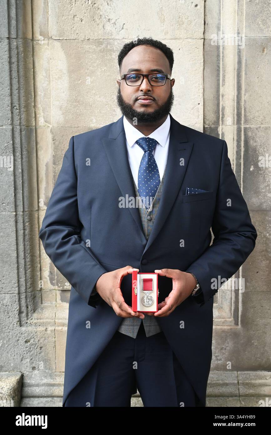 Ali Abdi with British Empire Medal in Cardiff Stock Photo - Alamy