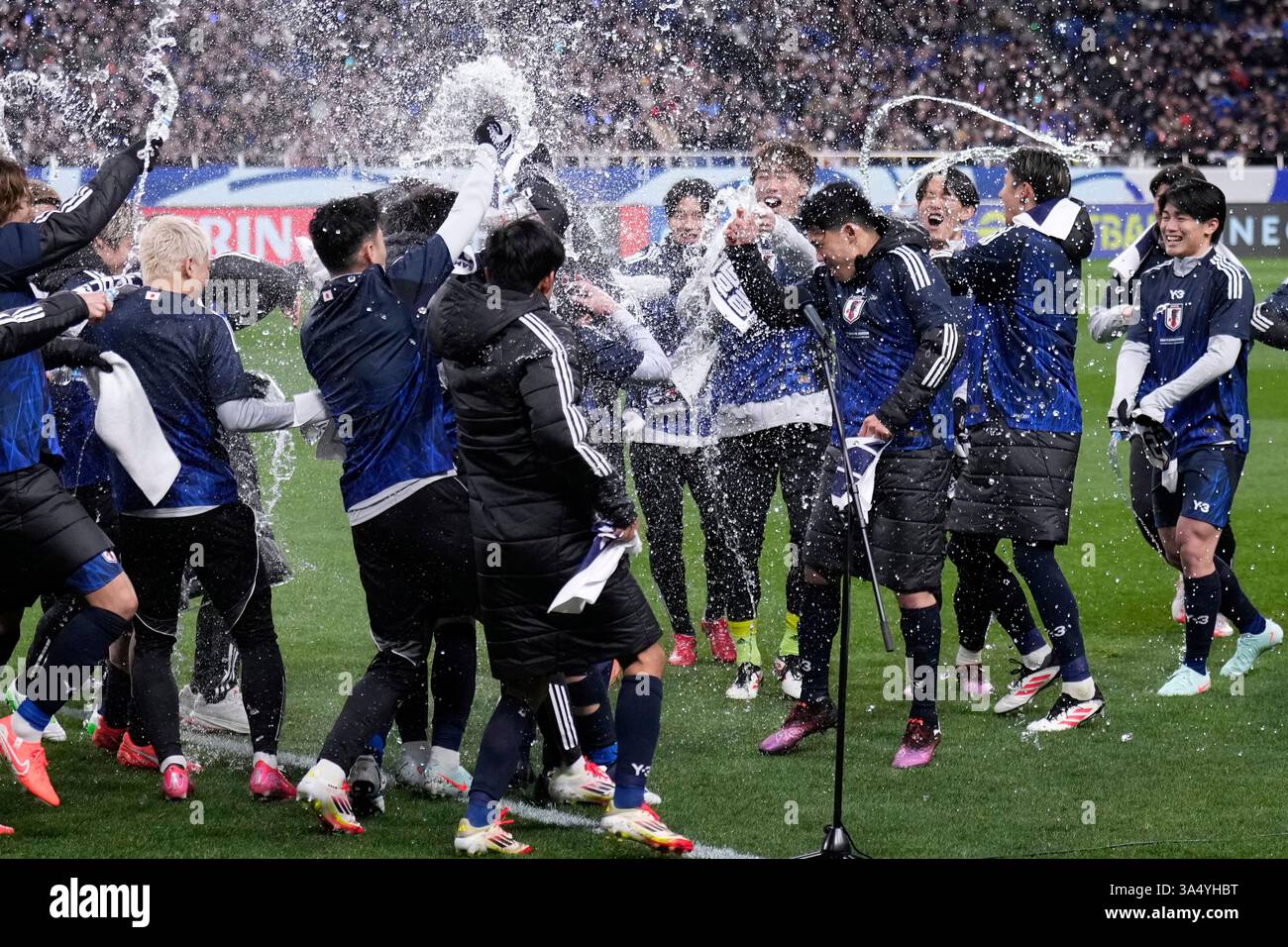 Japan players celebrate after defeating Bahrain in the World Cup ...