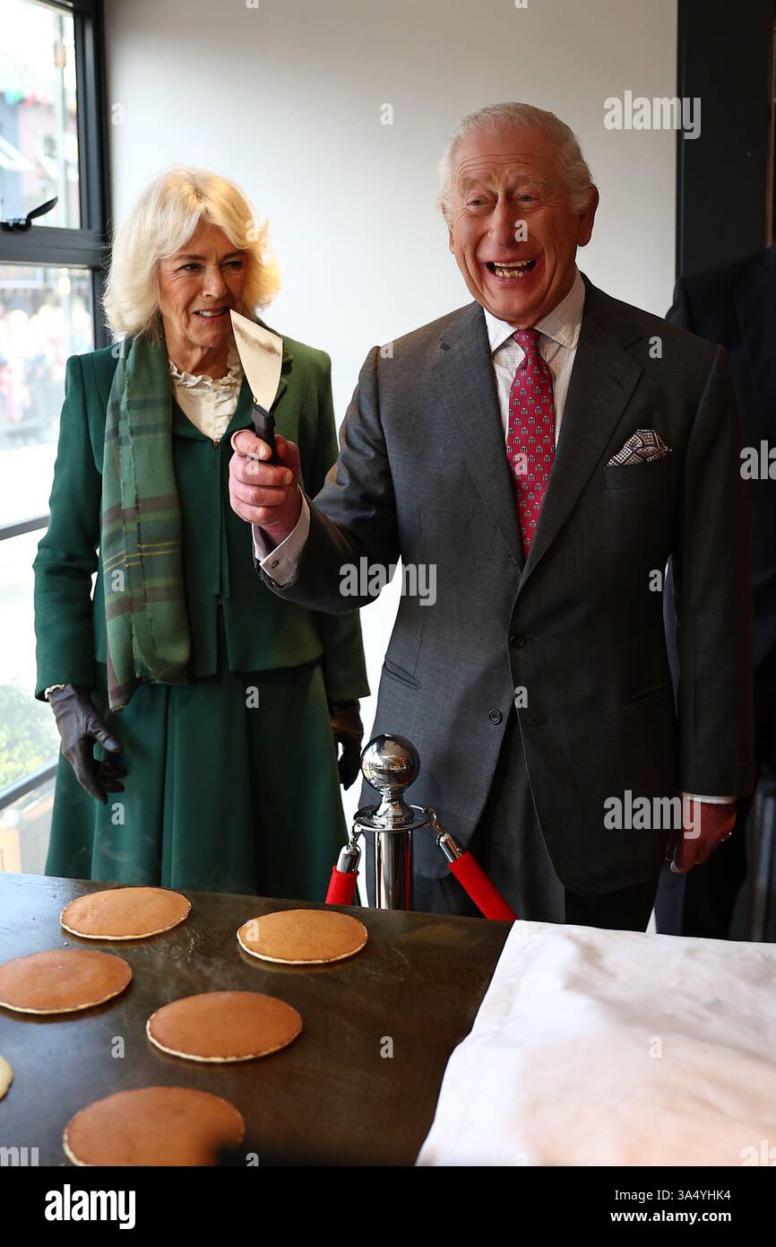 King Charles III and Queen Camilla see a demonstration of the ...