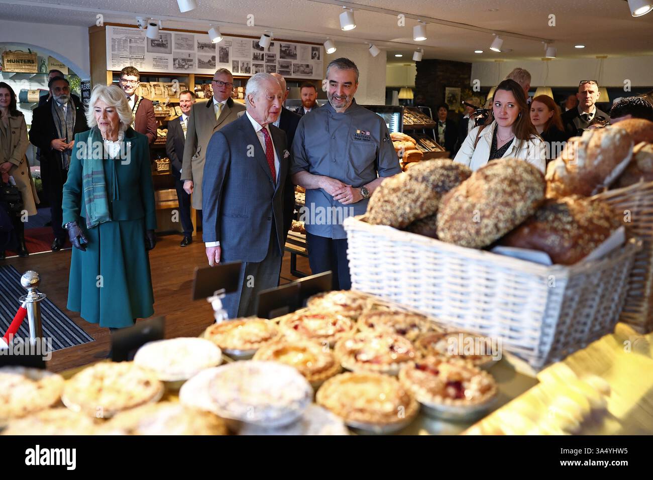 King Charles III and Queen Camilla are given a tour of Hunters Bakery ...