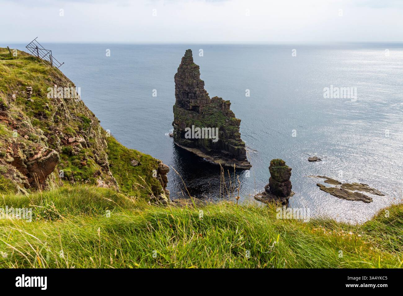 Duncansby Stacks, a breathtaking coastal wonder in Scotland, rise from the North Sea. Standing ...