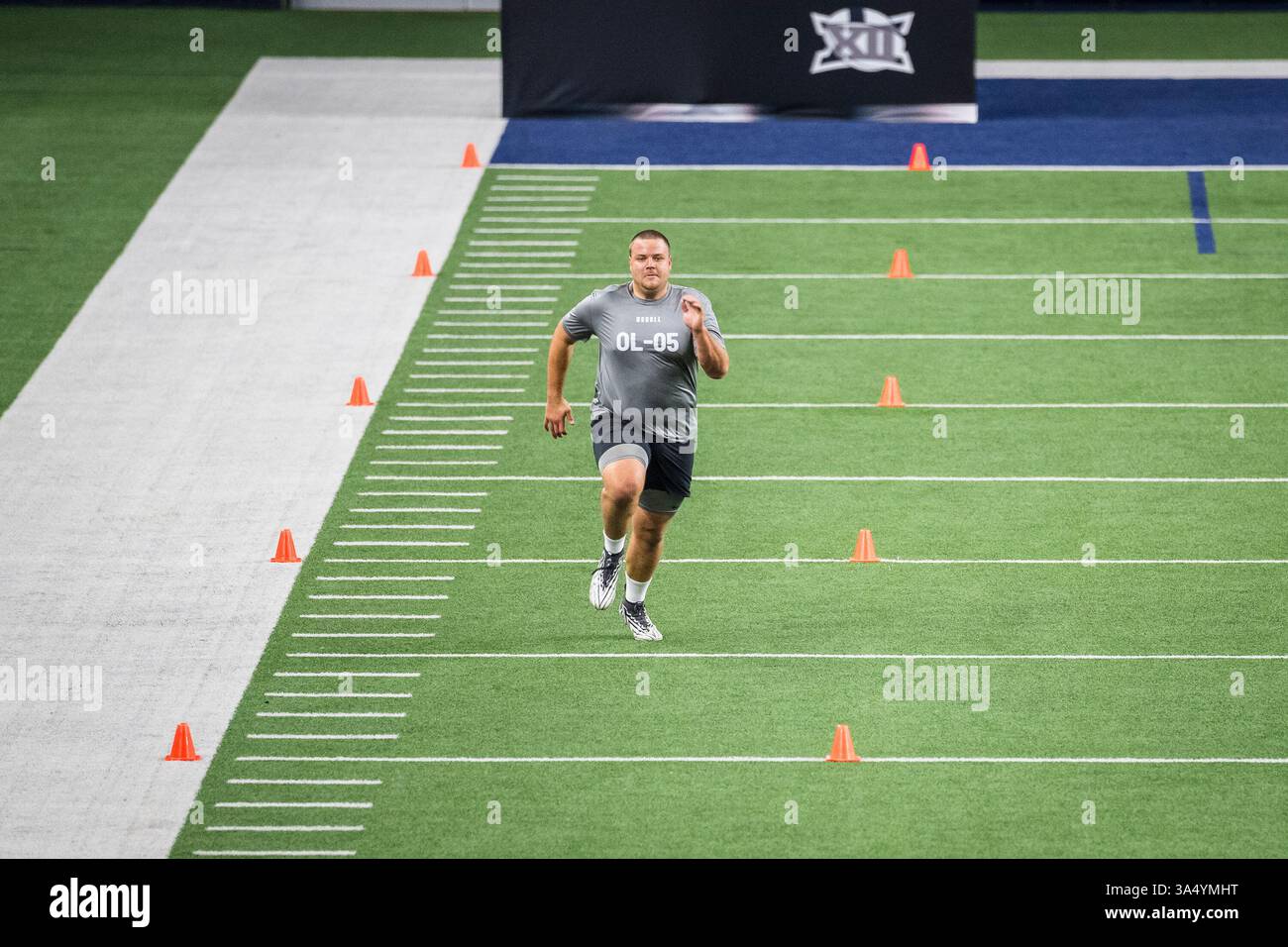 Arizona's Joey Capra runs a drill during the Big 12 Conference's NFL ...