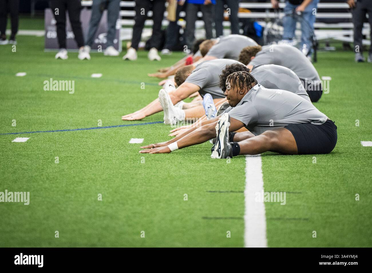 West Virginia's Jaquay Hubbard stretches during the Big 12 Conference's ...