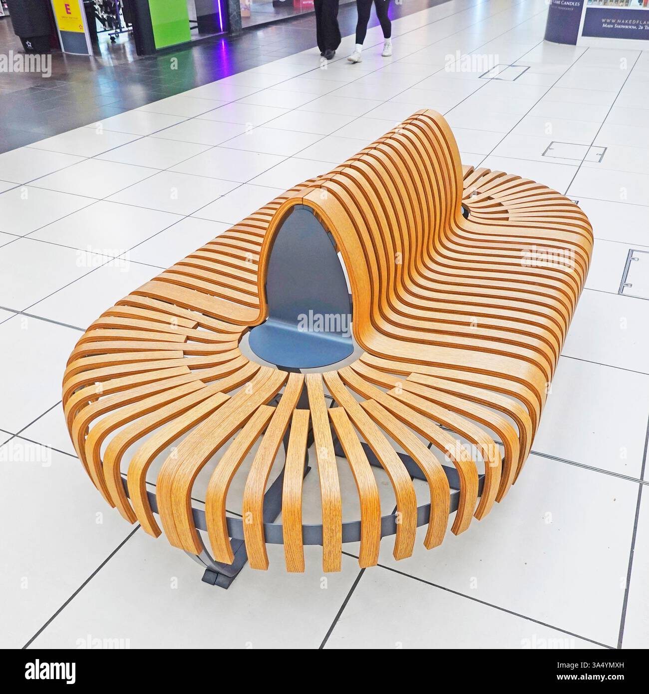 Modern design curved island seating unit on public floor space for ...